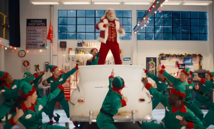 John Travolta’s Santa channels Danny Zuko for Capital One - Reel 360 News
